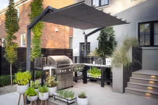 Retractable Canopies on a Rooftop Terrace from ShadeFX