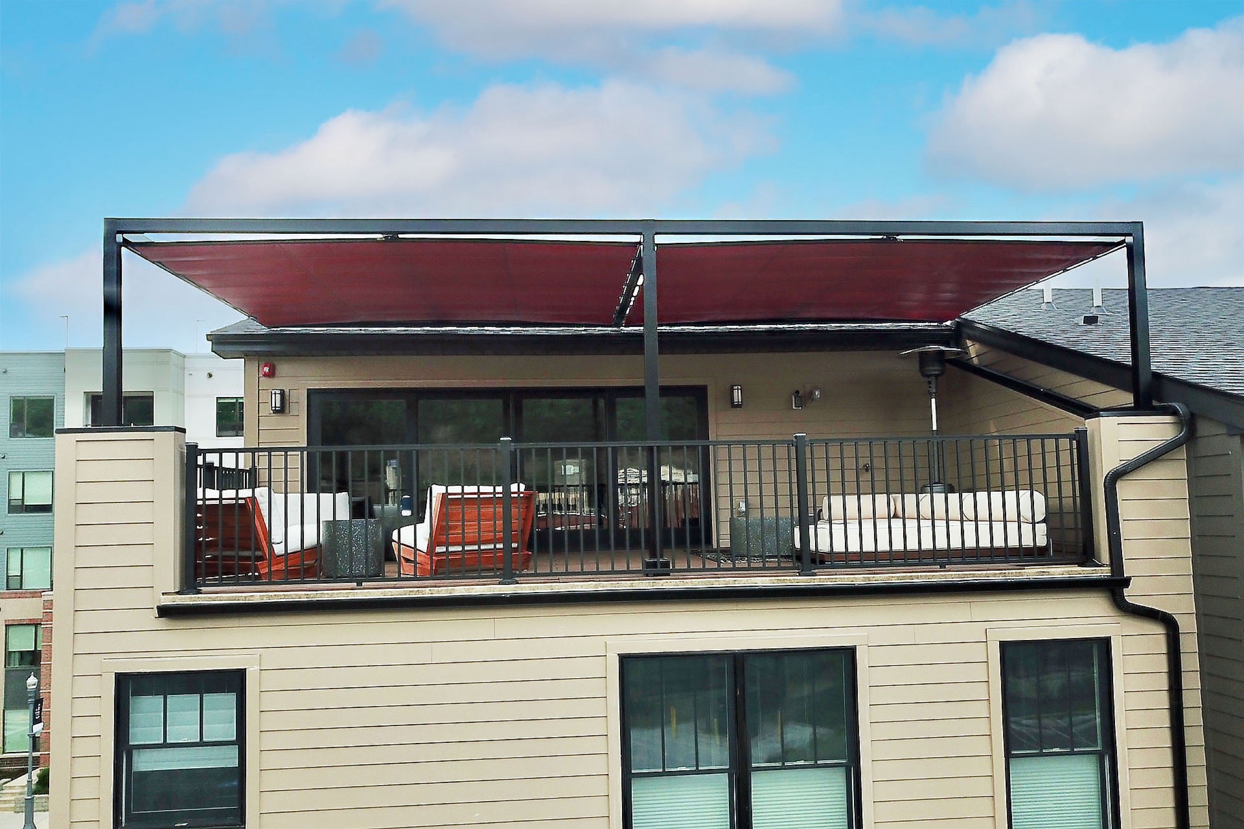 Retractable Canopies on a Rooftop Terrace from ShadeFX