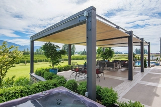 Retractable Canopies on a Rooftop Terrace from ShadeFX