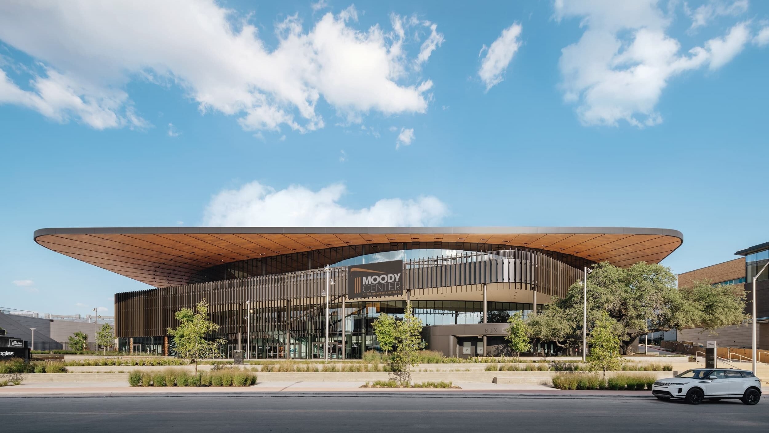 Curved Wooden Soffit in the UT Moody Center Arena from PARKLEX PRODEMA